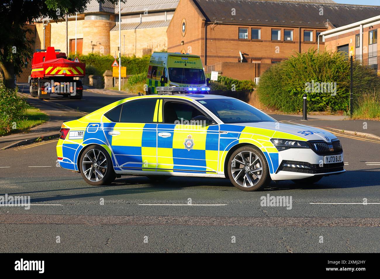 Vehicles from West Yorkshire Police Force used as roadblocks at a fire ...