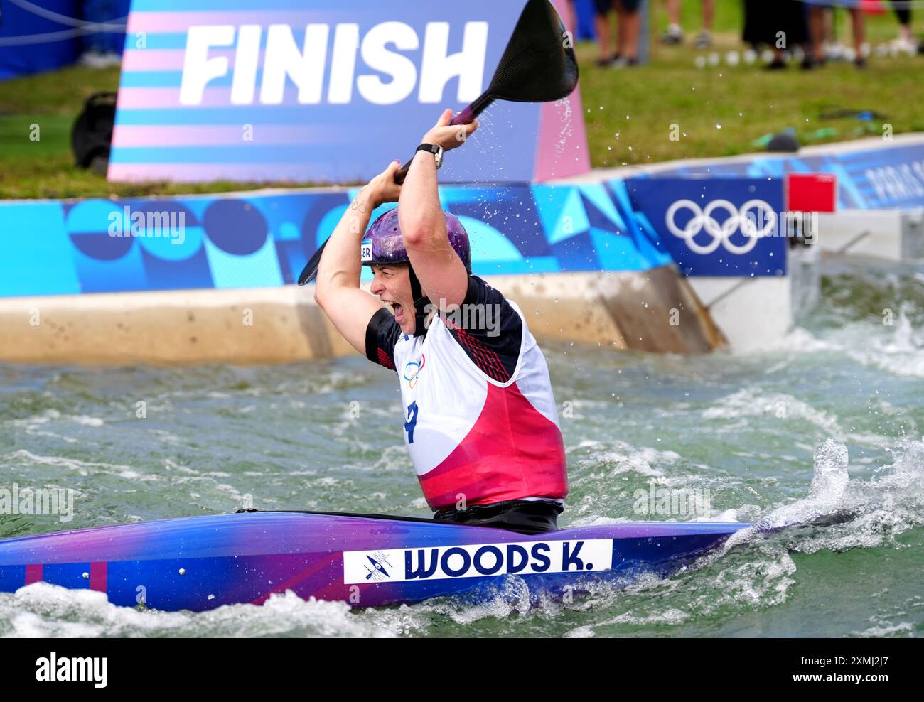 Great Britain's Kimberley Woods reacts as she crosses the finish line ...