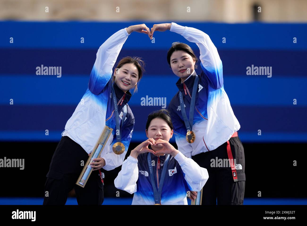 Gold medal winners, South Korea's Jeon Hun-young, left, Lim Si-hyeon ...