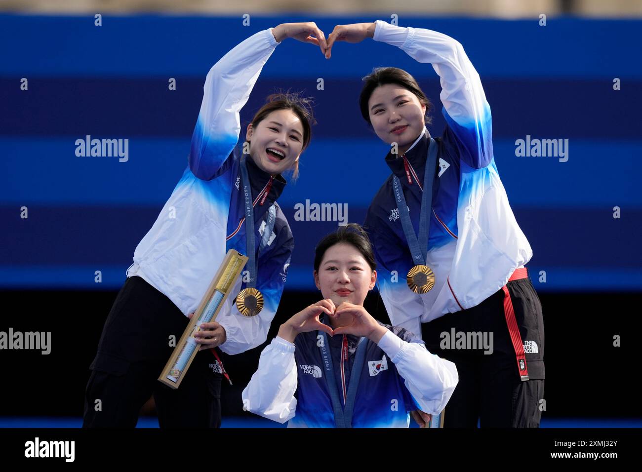 Gold medal winners, South Korea's Jeon Hun-young, left, Lim Si-hyeon ...