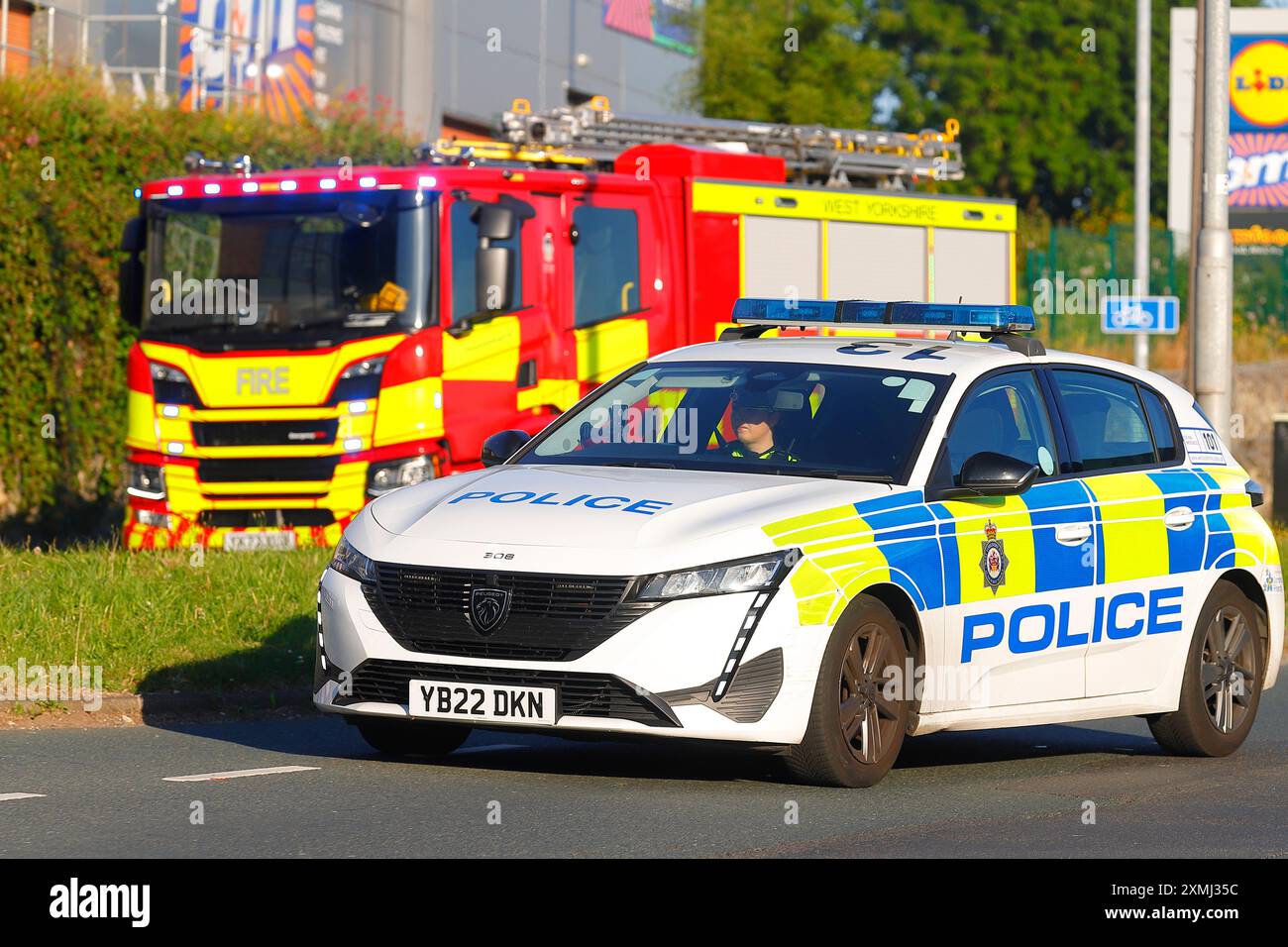 Emergency response vehicles attending to a fire at Canal Mills in the ...