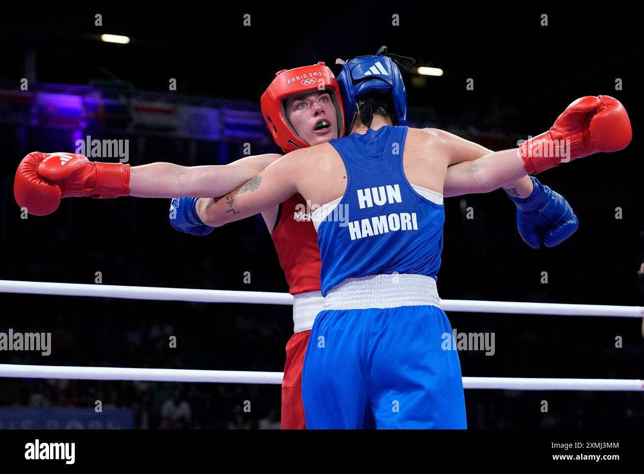 Ireland's Grainne Walsh, red, fights Hungary's Anna Hamori in their ...