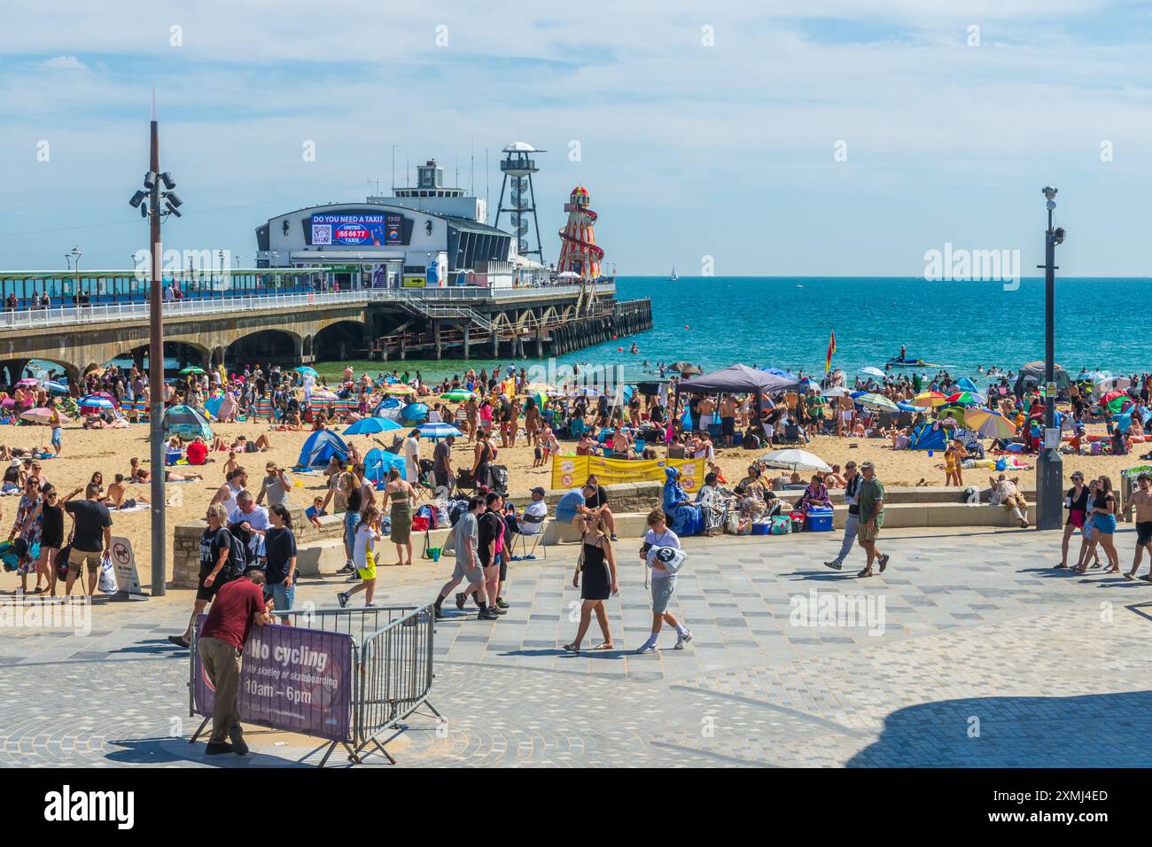 Bournemouth, UK - July 28th 2024: People on the promenade in front of ...
