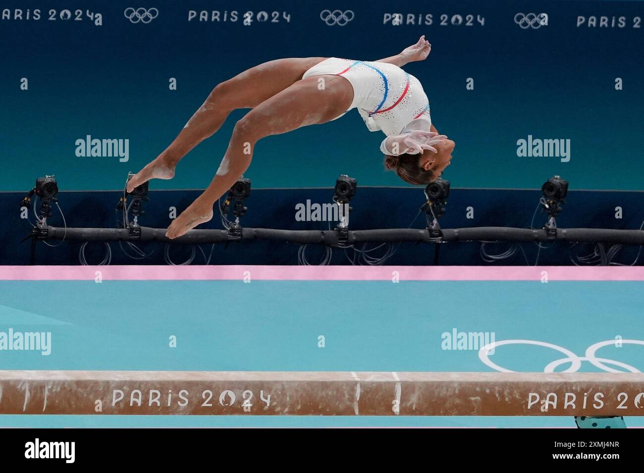Marine Boyer, of France, performs on the beam during a women's artistic ...