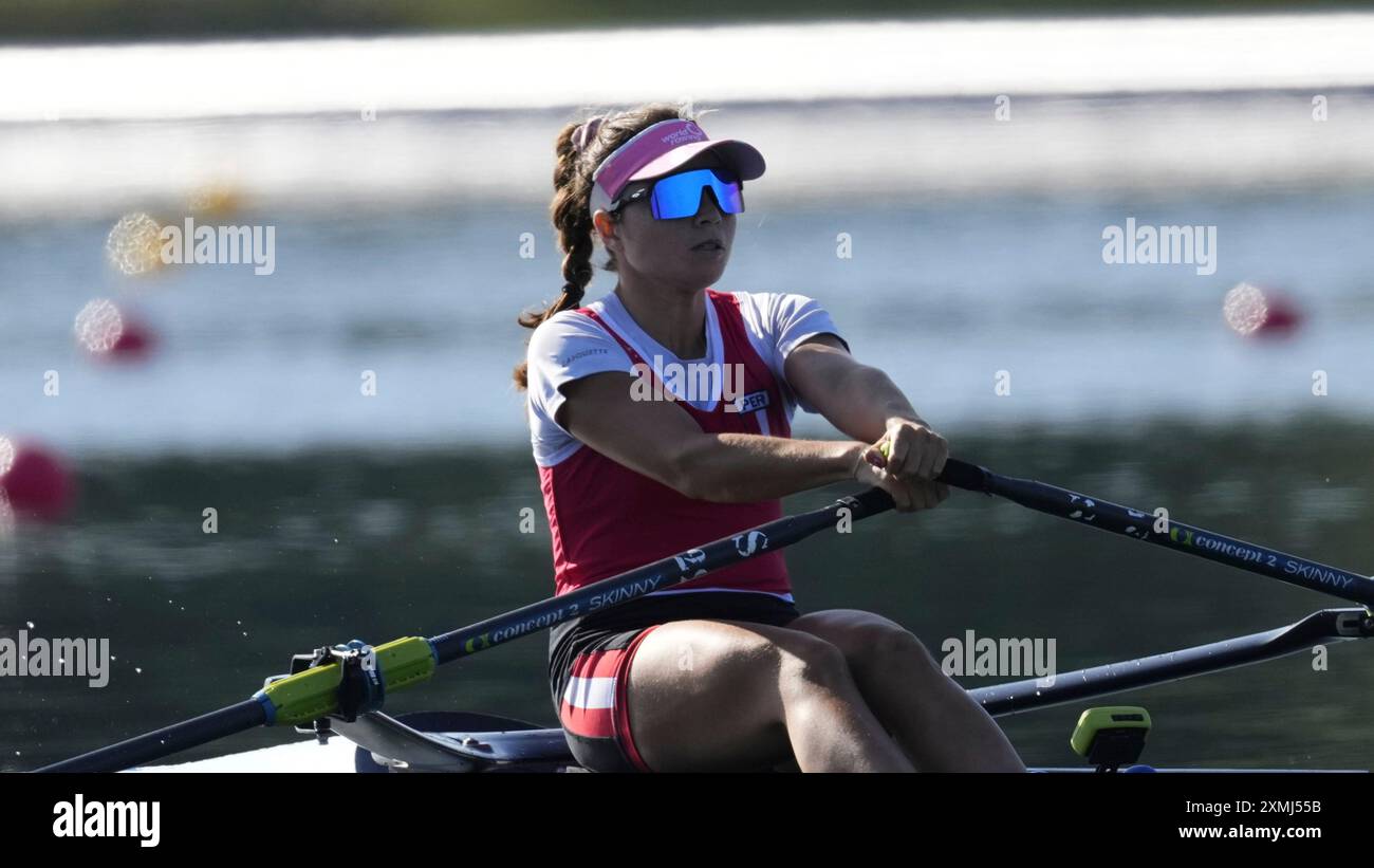 Adriana Sanguineti, of Peru, competes in the women's single scull ...
