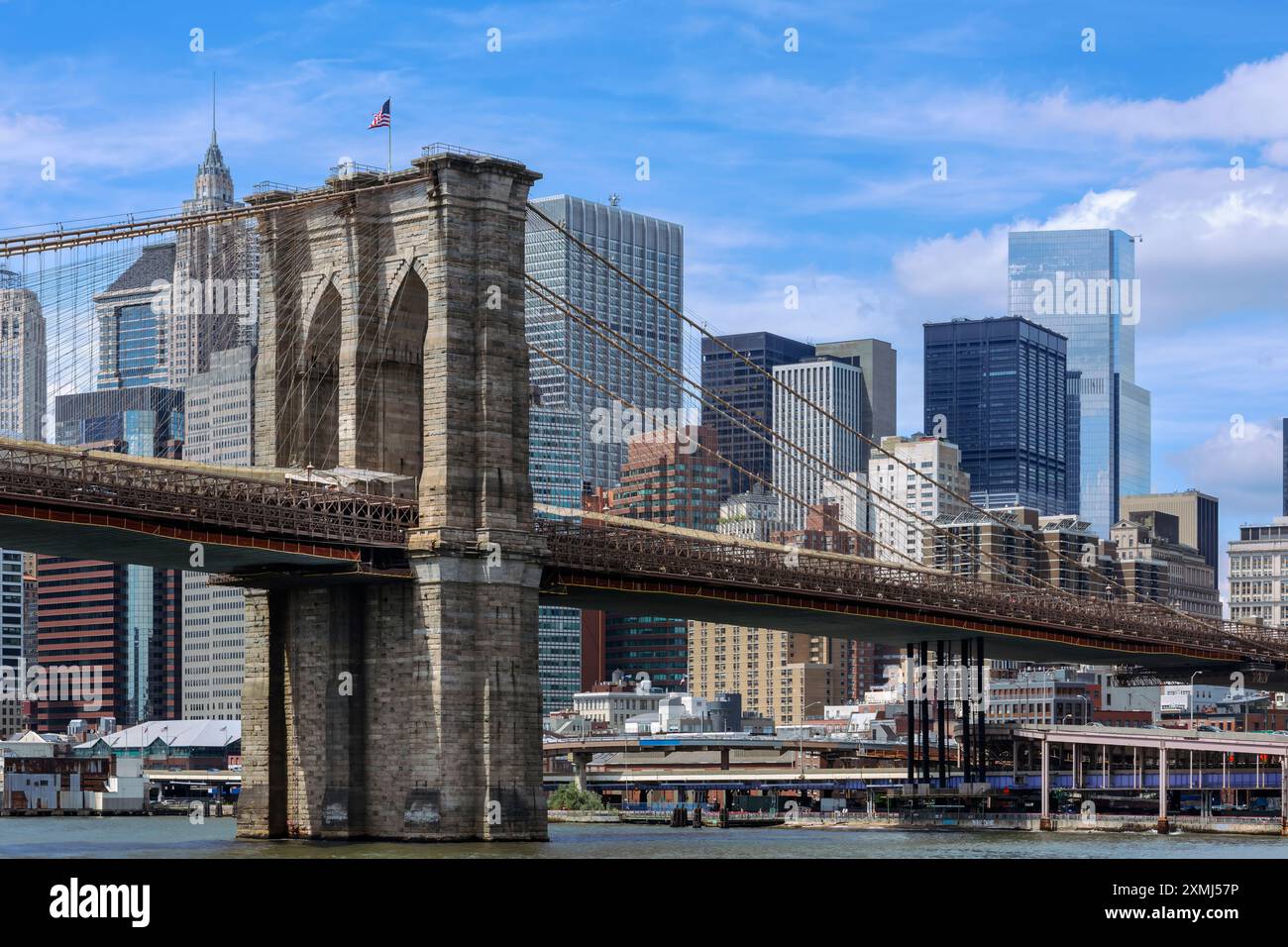 Spanning the East River between Manhattan and Brooklyn, the Brooklyn ...