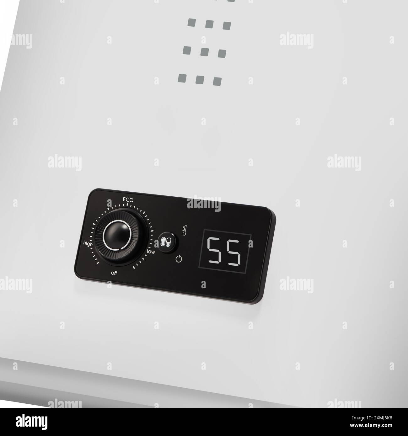 Close-up modern tanked boiler thermostat interface. Digital display of ...