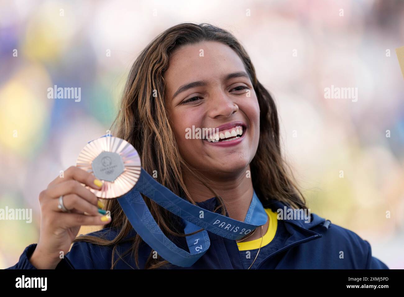 Rayssa Leal, of Brazil, poses with her bronze medal after the women's ...