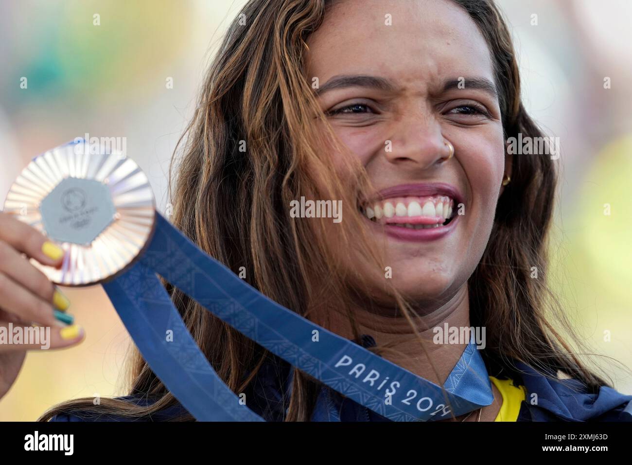 Rayssa Leal, of Brazil, poses with her bronze medal after the women's ...