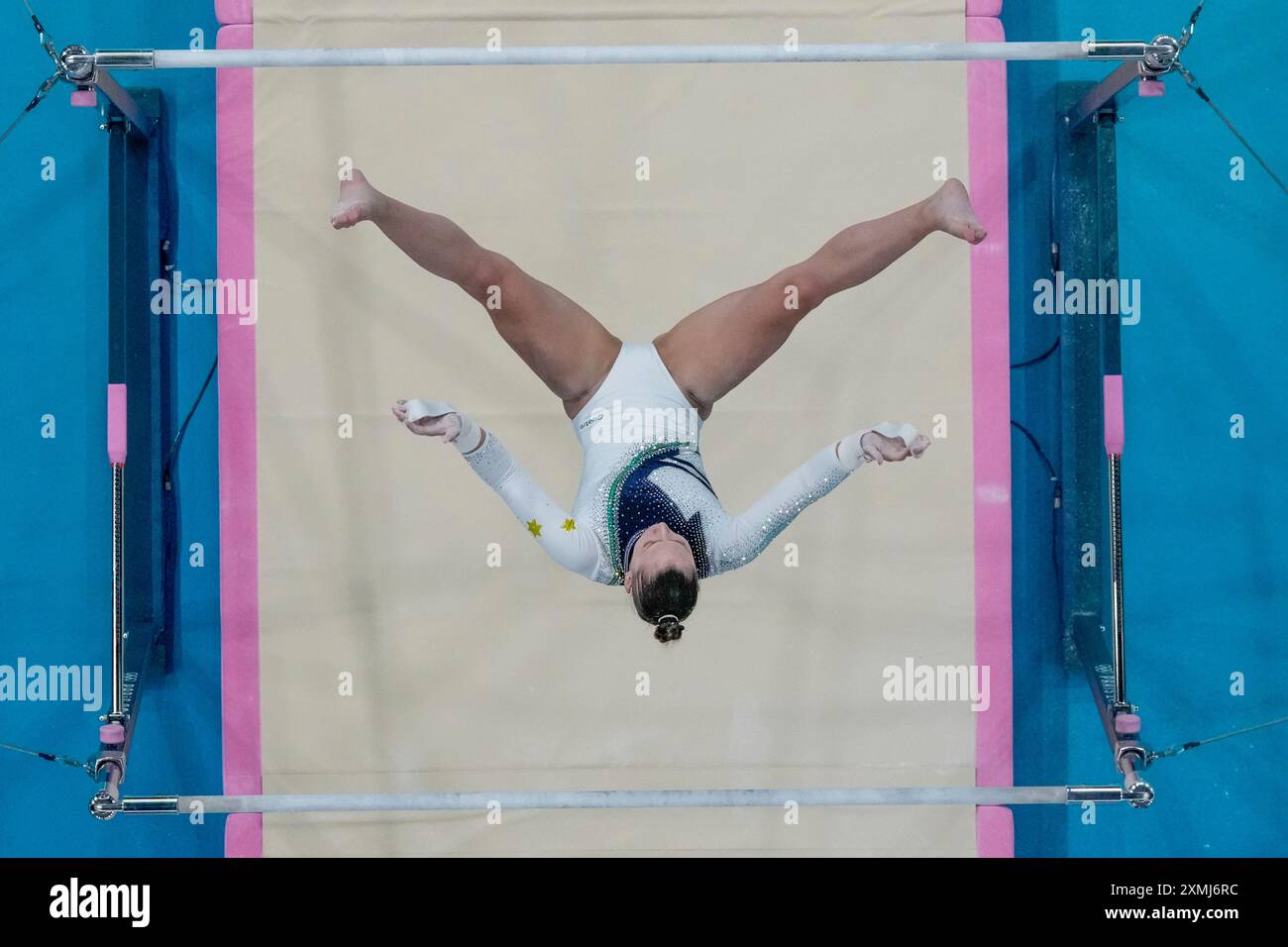 Lucija Hribar, of Slovenia, performs on the uneven bars during a women ...