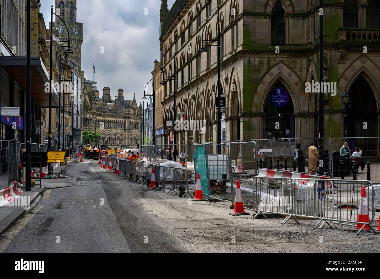 Walking Cycling Improvements creating pedestrianised zone (men working ...
