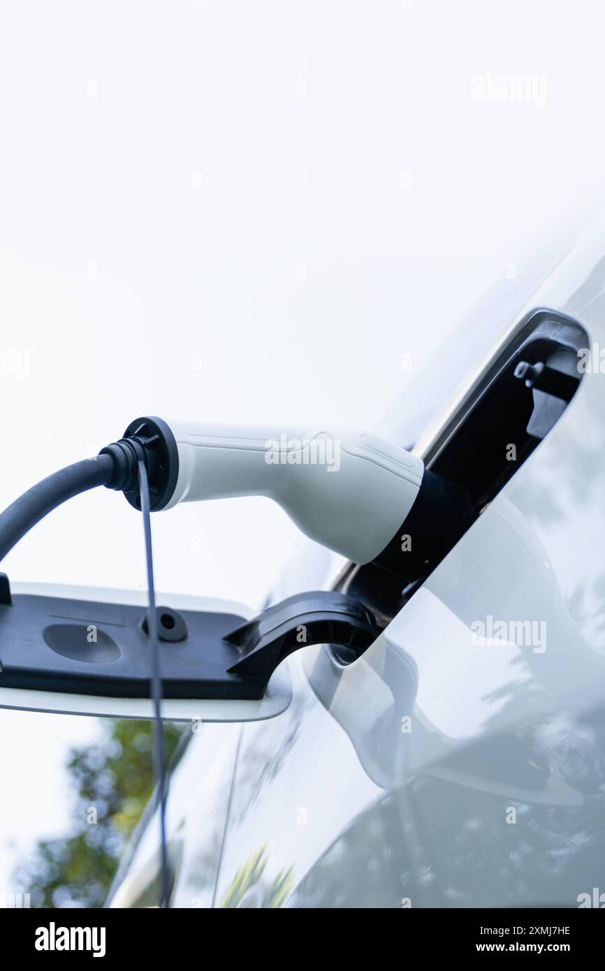 Electricity plug for electric vehicle hi-res stock photography and ...