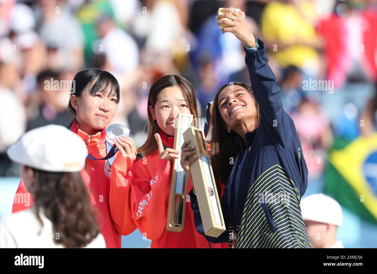 (L-R) AKAMA Liz of Japan, the silver medalist, YOSHIZAWA Coco of Japan ...