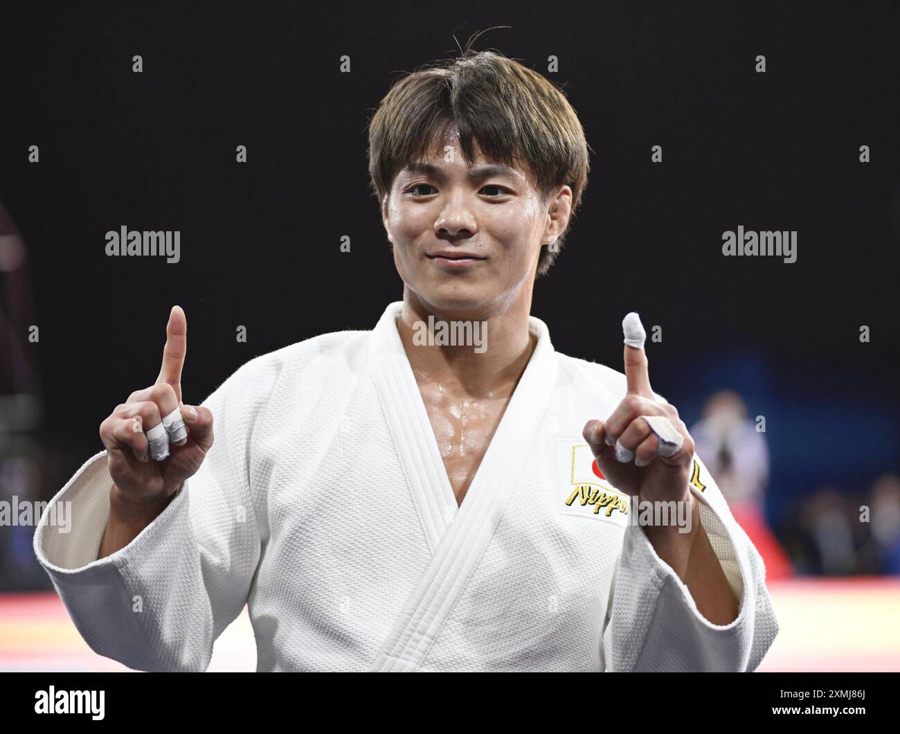 Hifumi Abe of Japan poses after beating Willian Lima of Brazil in the ...