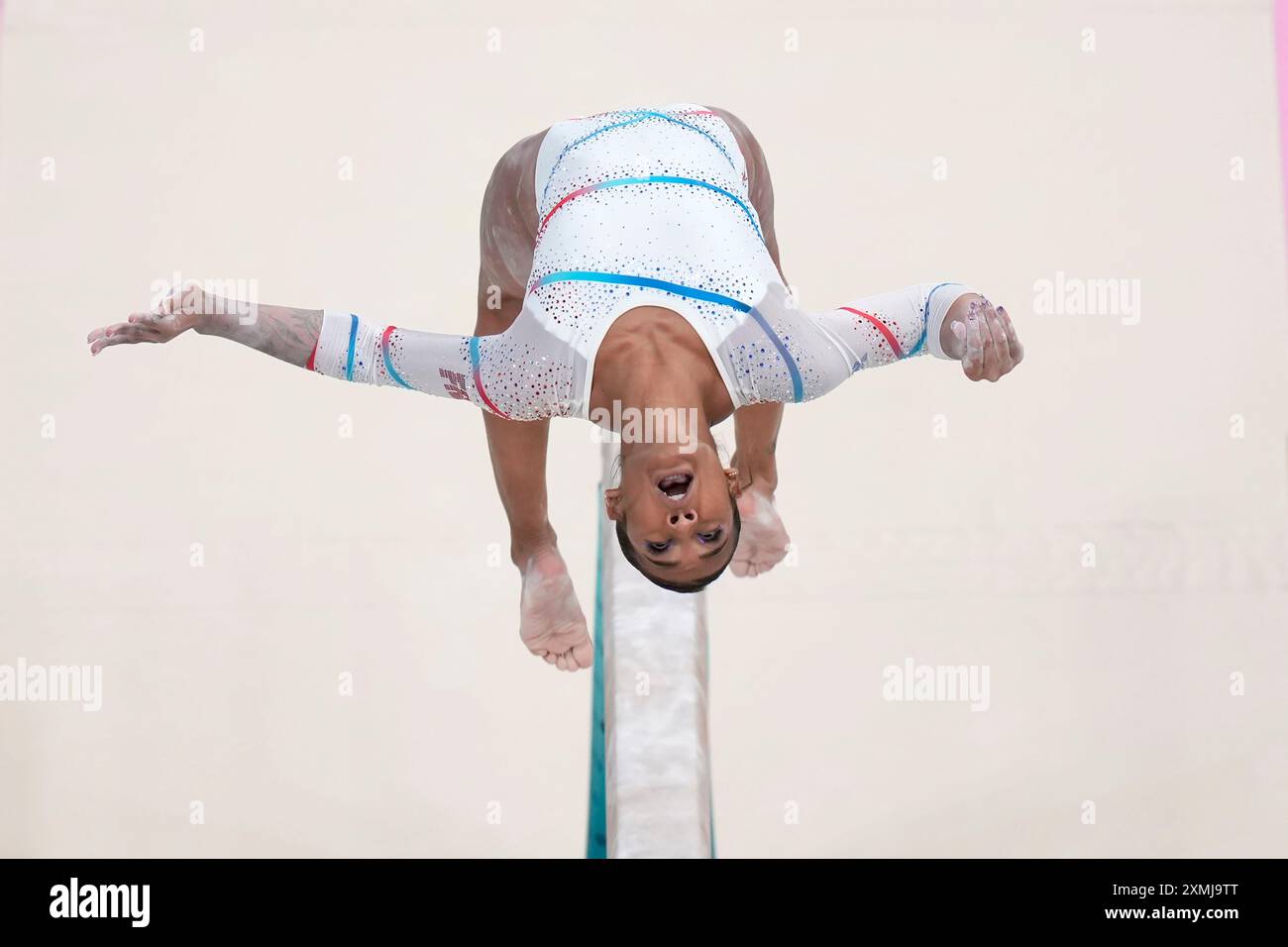 Marine Boyer, of France, flips on the beam during a women's artistic ...
