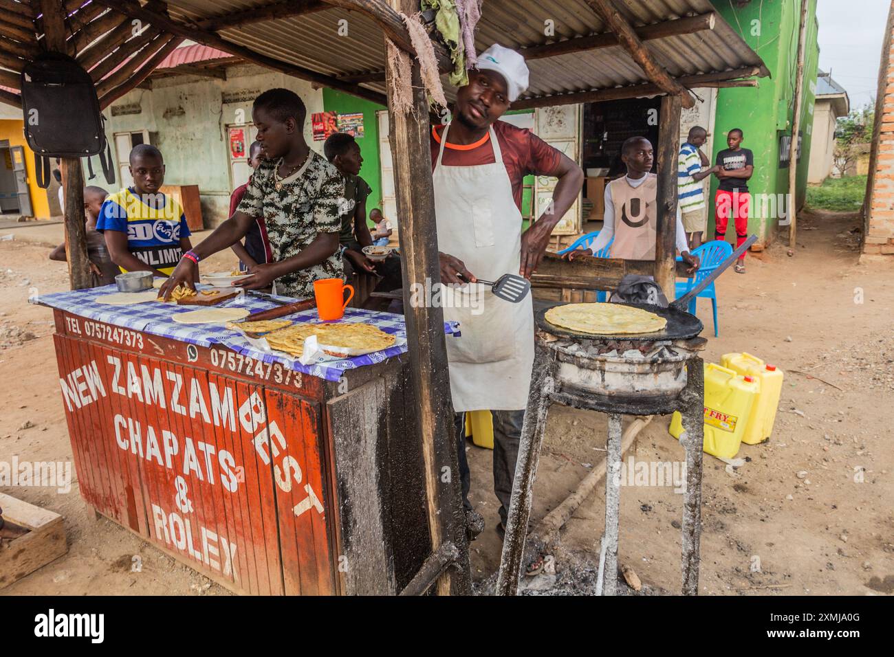 KATUNGURU, UGANDA - MARCH 16, 2020: Rolex (egg omelette and vegetables ...
