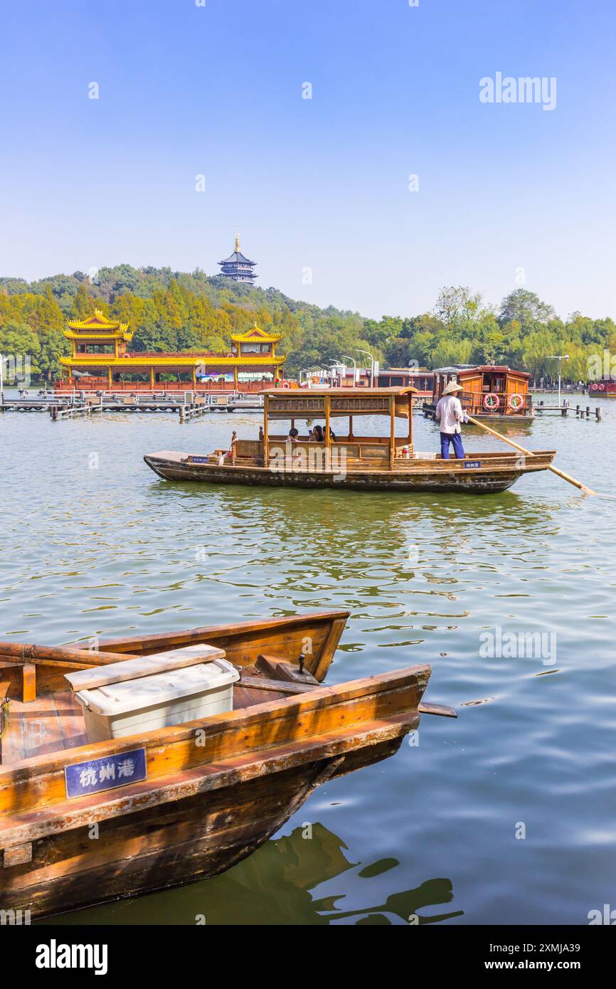 Traditional wooden boats in the harbor of West Lake in Hangzhou, China ...
