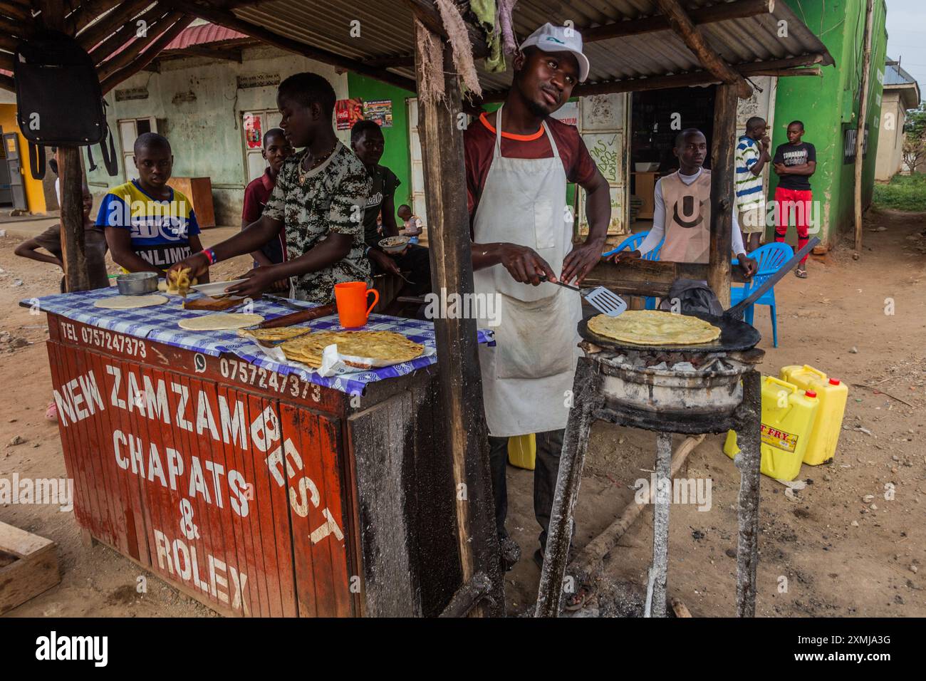 KATUNGURU, UGANDA - MARCH 16, 2020: Rolex (egg omelette and vegetables ...