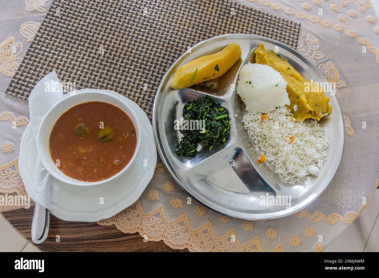 Lunch in Uganda - bean soup with matoke (mashed plantains), rice, posho ...