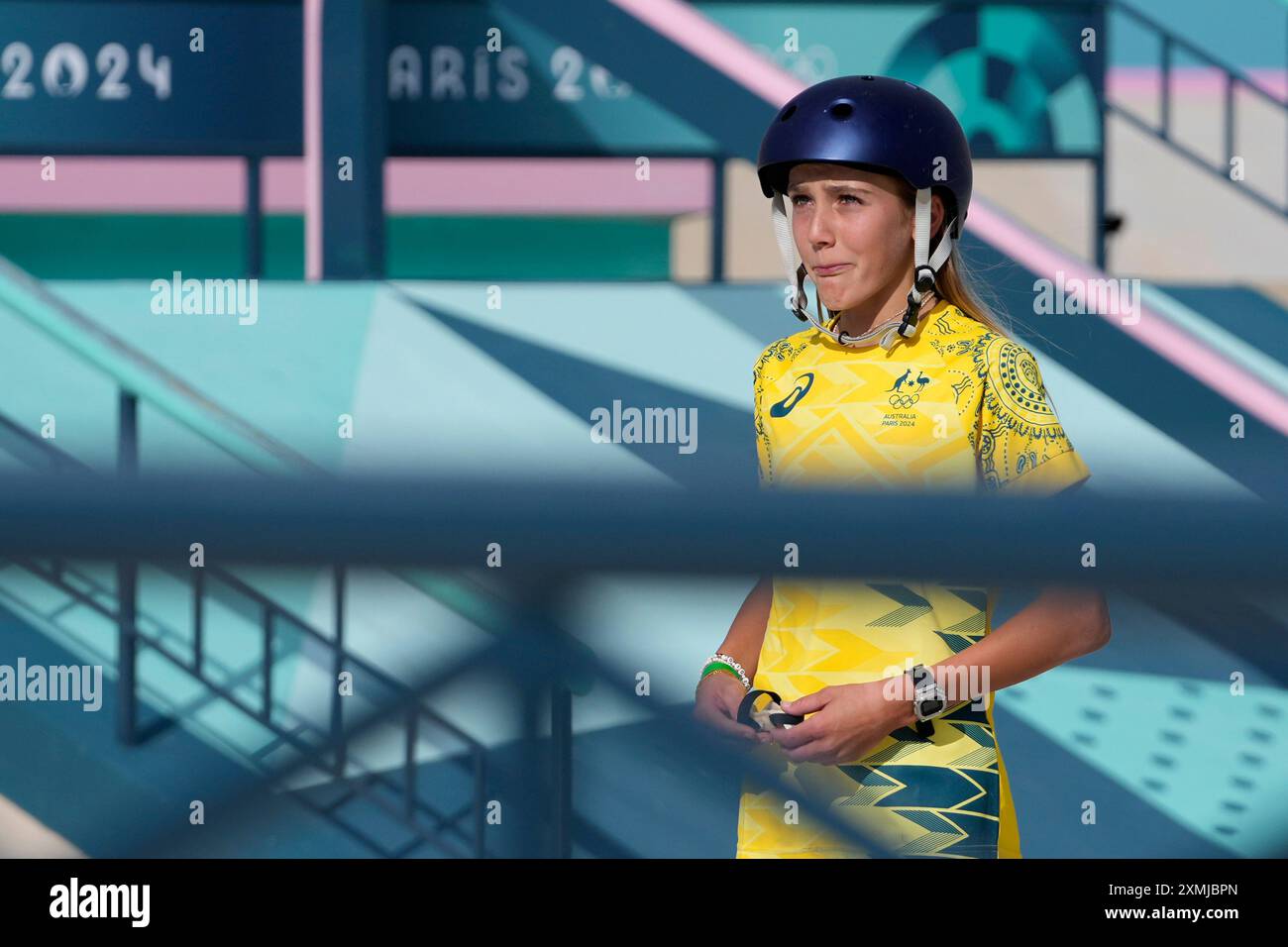 Chloe Covell, of Australia, struggles to hold back her tears at the end ...