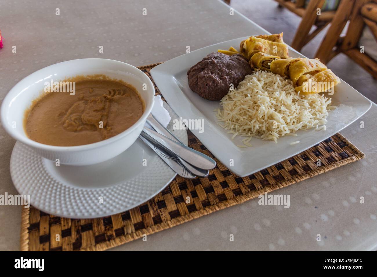 Meal in Uganda - groundnut (peanut) sauce, rice, chapati and posho corn ...