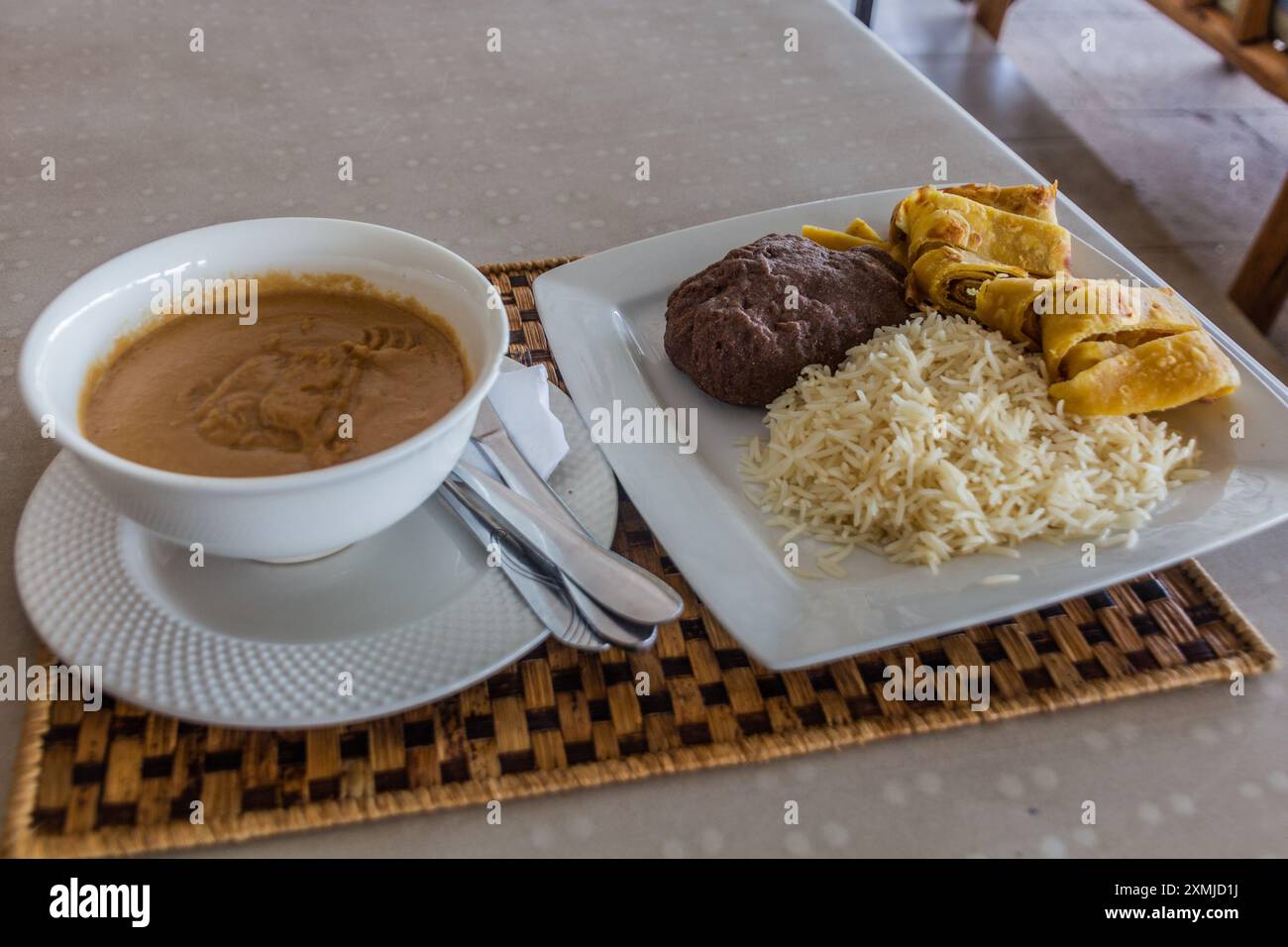 Meal in Uganda - groundnut (peanut) sauce, rice, chapati and posho corn ...