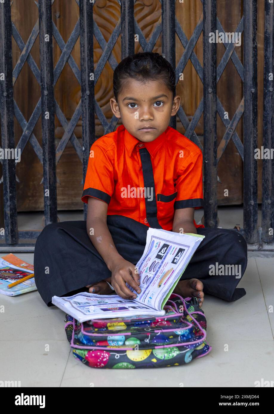 Bangladeshi boy in a religious school in an hindu temple, Rajshahi ...
