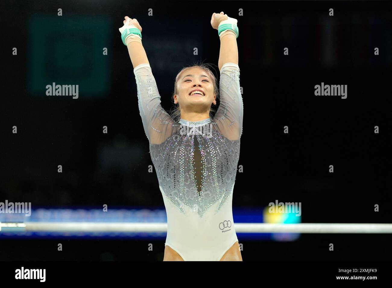 Dayeong Lee, of South Korea, finishes on the uneven bars during a women's artistic gymnastics ...