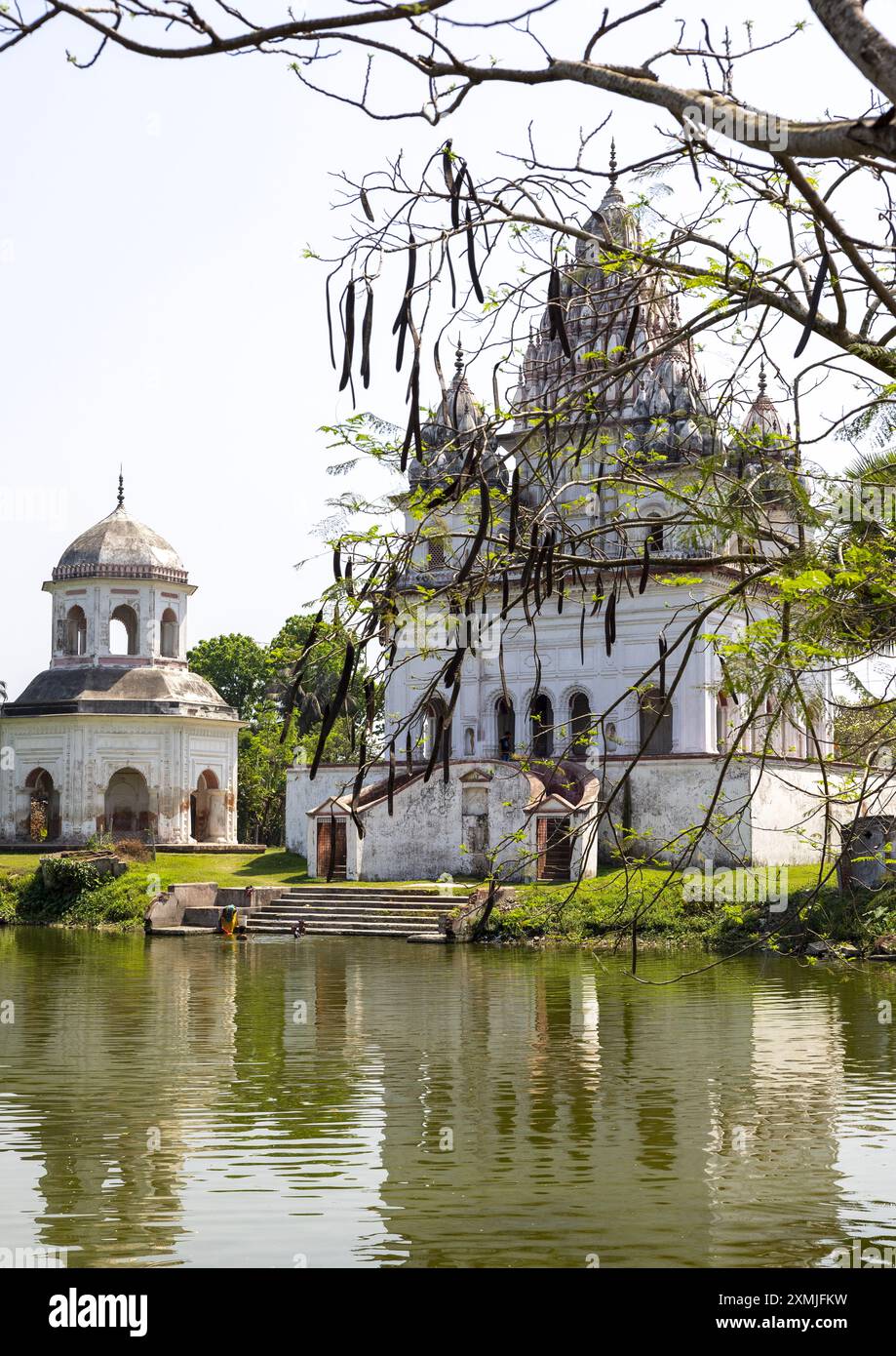 The Roth temple and Shiva Temple over the Shiv Sagar lake, Rajshahi Division, Puthia, Bangladesh ...