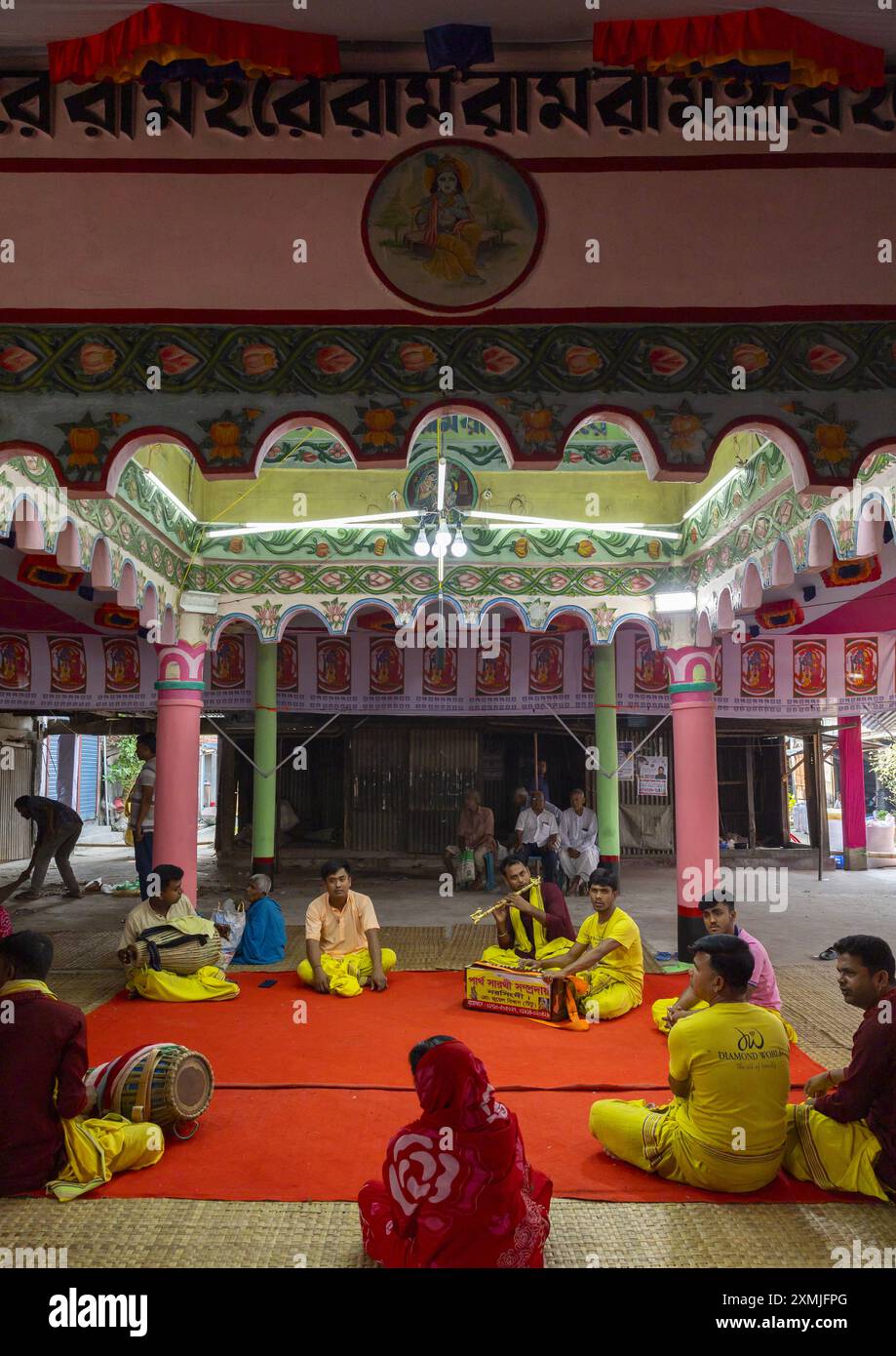 Hindu people singing in a temple, Barisal Division, Harta, Bangladesh ...