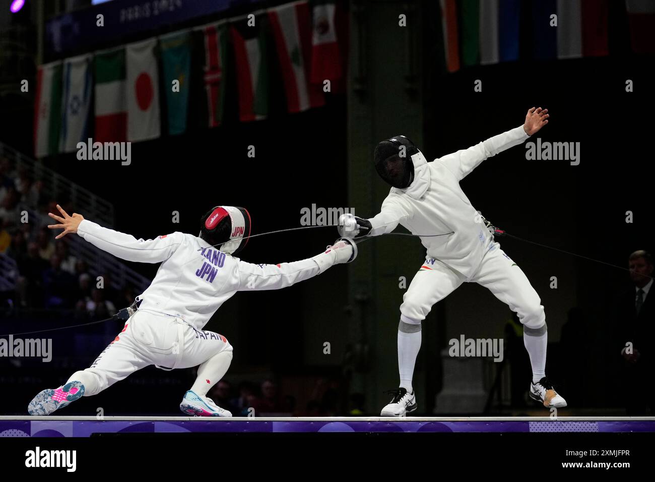Japan's Koki Kano, left, competes with Hungary's Tibor Andrasfi in the ...