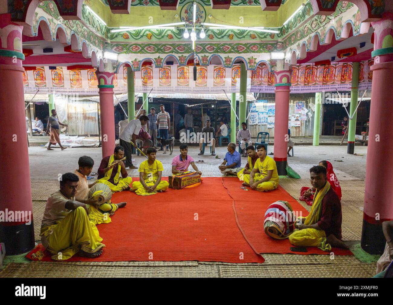 Group of hindu people praying in temple hi-res stock photography and ...