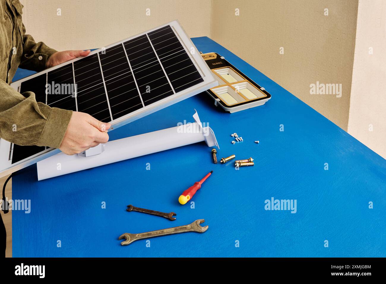 Installation of an autonomous, wireless solar street lamp, attaching ...