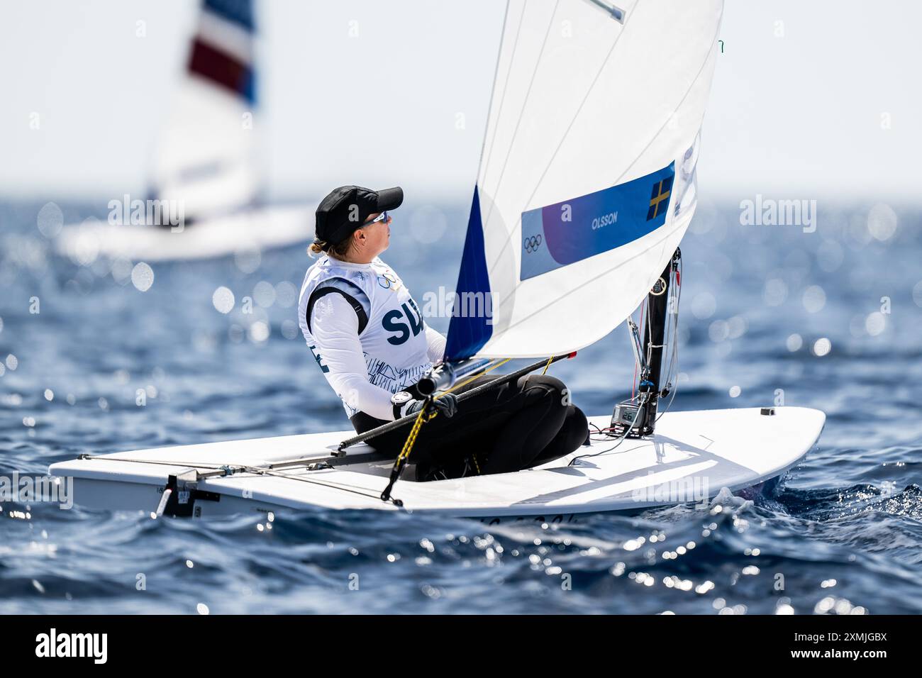 Josefin Olsson of, Sweden. , . at a women's dinghy - laser radial sailing training session ...
