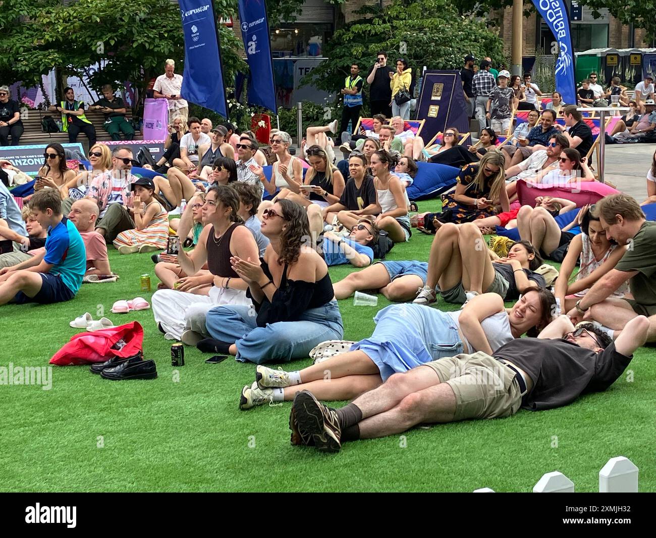 Spectators at the Olympics fanzone in King's Cross, London. Picture ...