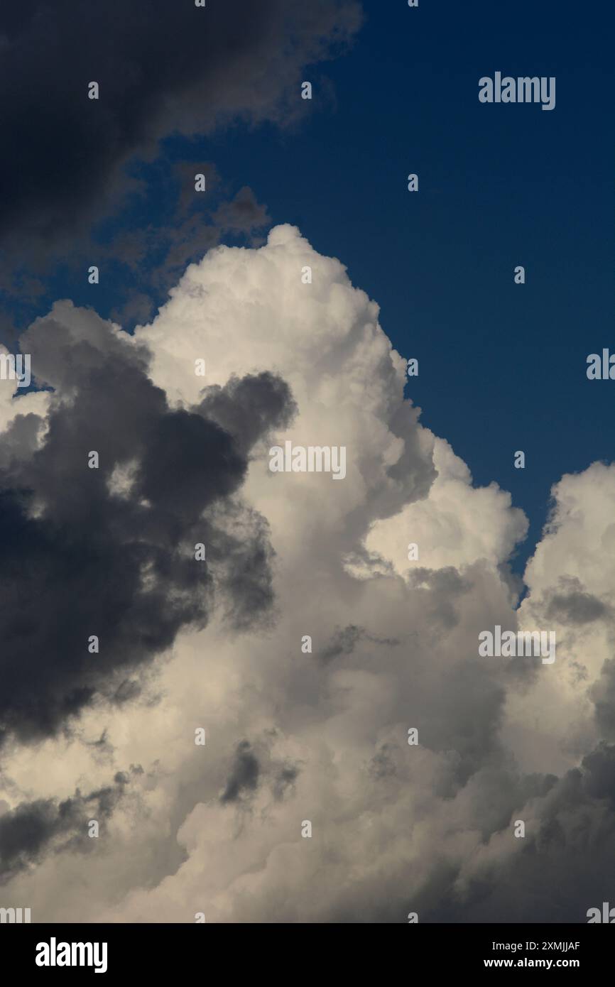 Cumulus clouds form in the sky high over Asheville, North Carolina ...