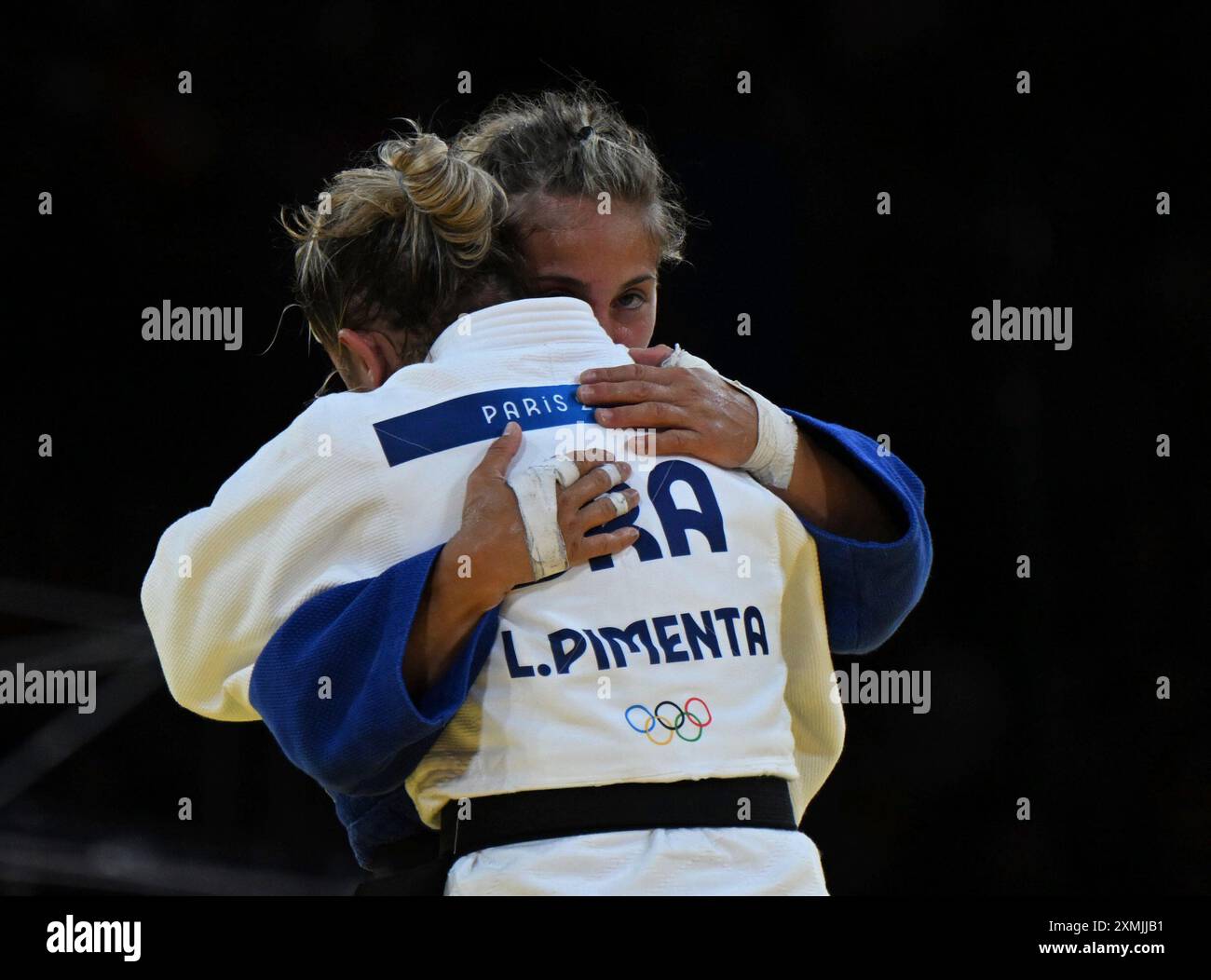 GIUFFRIDA Odette of Italy (blue) hugs PIMENTA Larissa of Brazil reacts ...