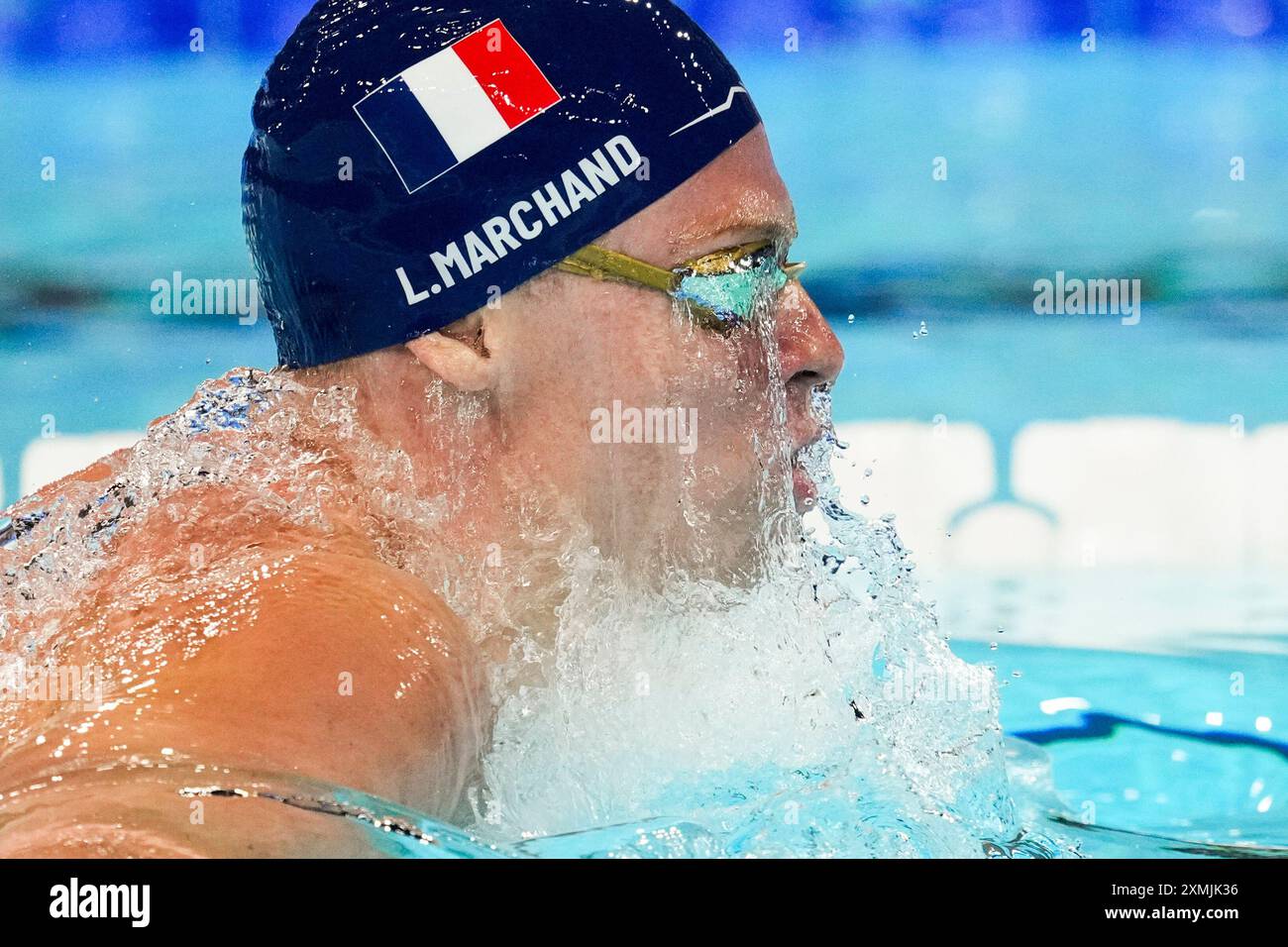 Leon Marchand, of France, competes in the men's 400-meter individual ...