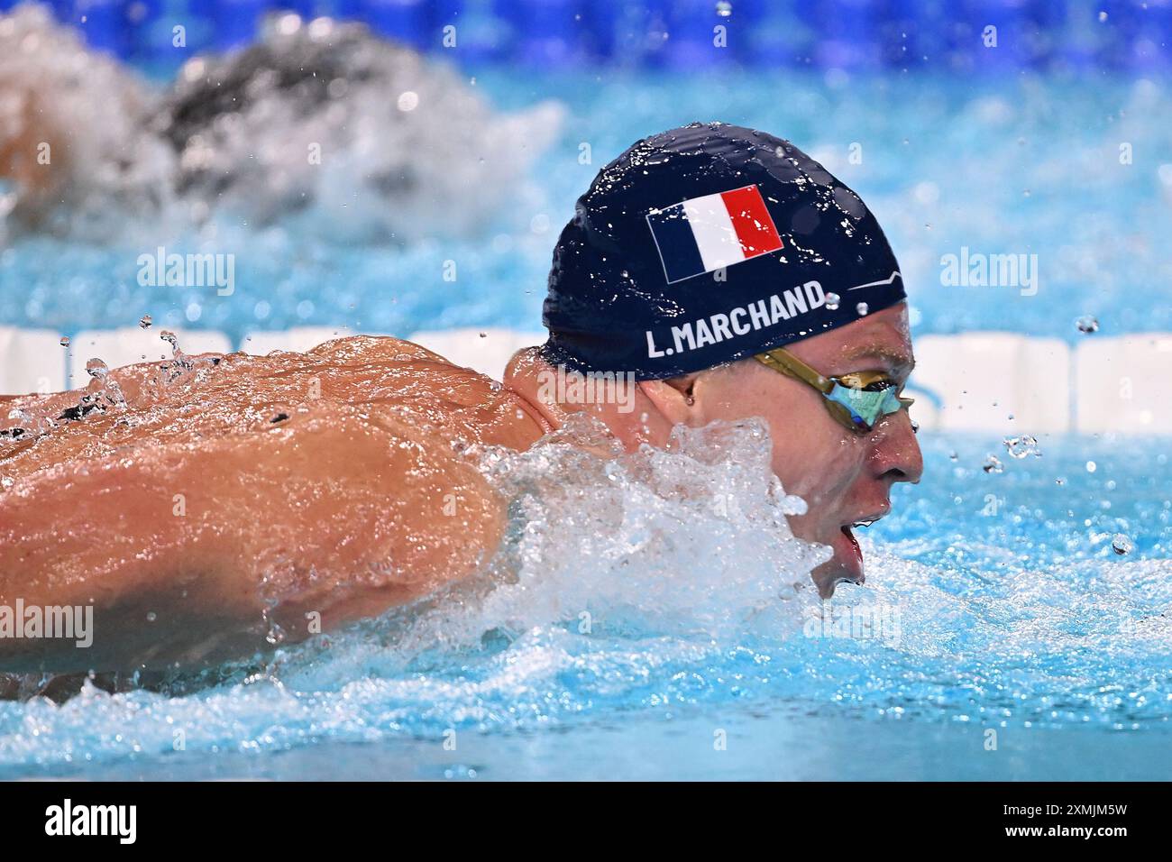 Paris, France. 28th July, 2024. French swimmer Léon Marchand swims in ...