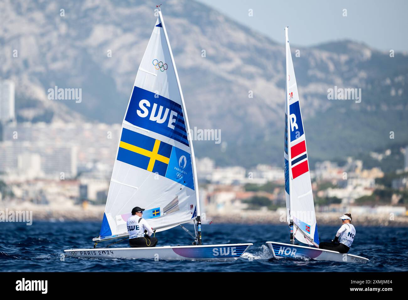Josefin Olsson of, Sweden. , . and Line Flem Høst of Norway at a women's dinghy - laser radial ...