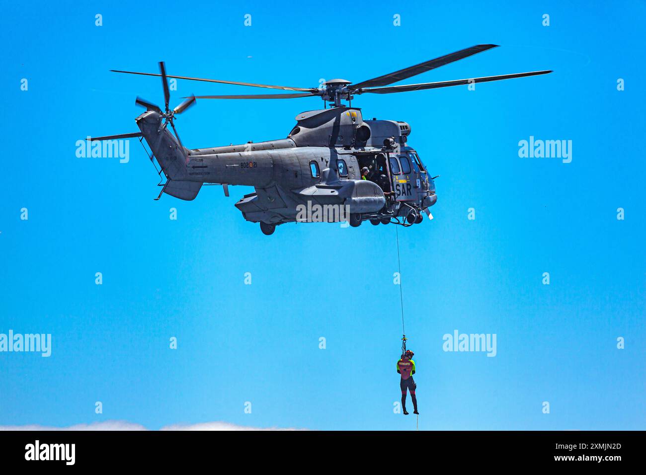 Spanish military SAR Squadron performing an air rescue Stock Photo - Alamy