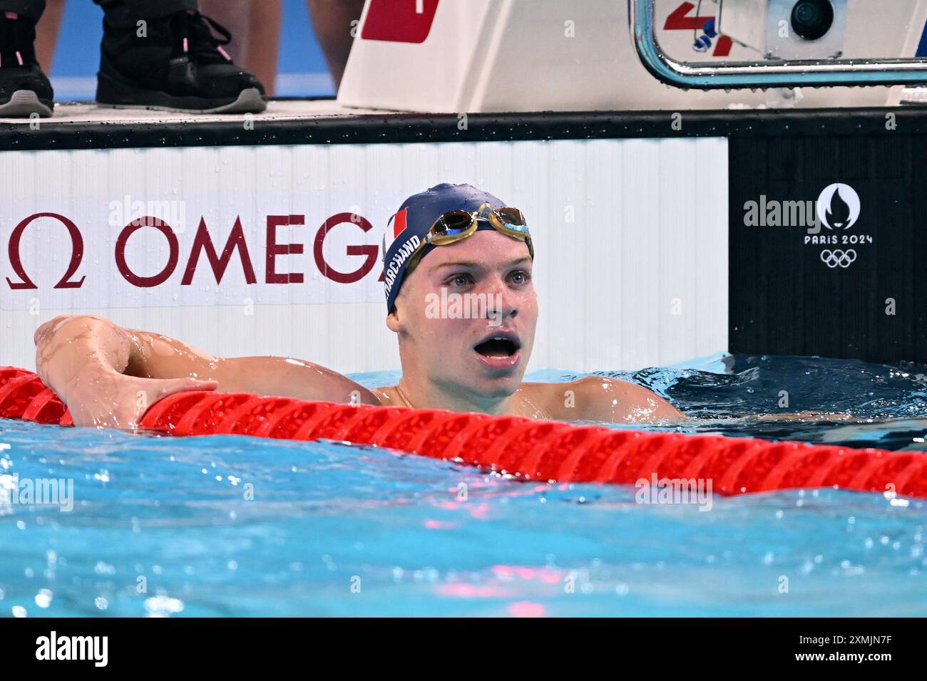 Paris, France. 28th July, 2024. French swimmer Léon Marchand reacts ...