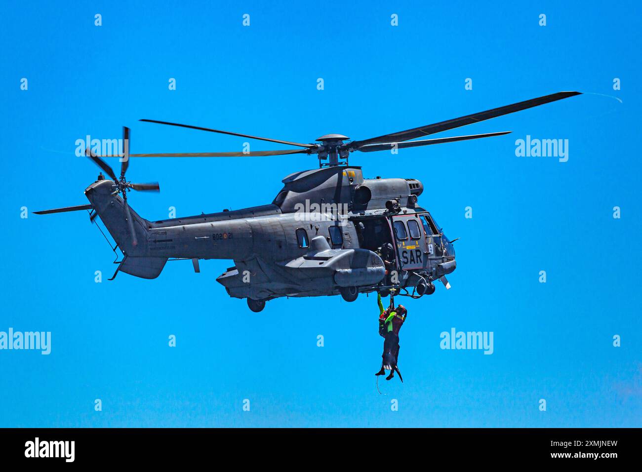 Spanish military SAR Squadron performing an air rescue Stock Photo - Alamy
