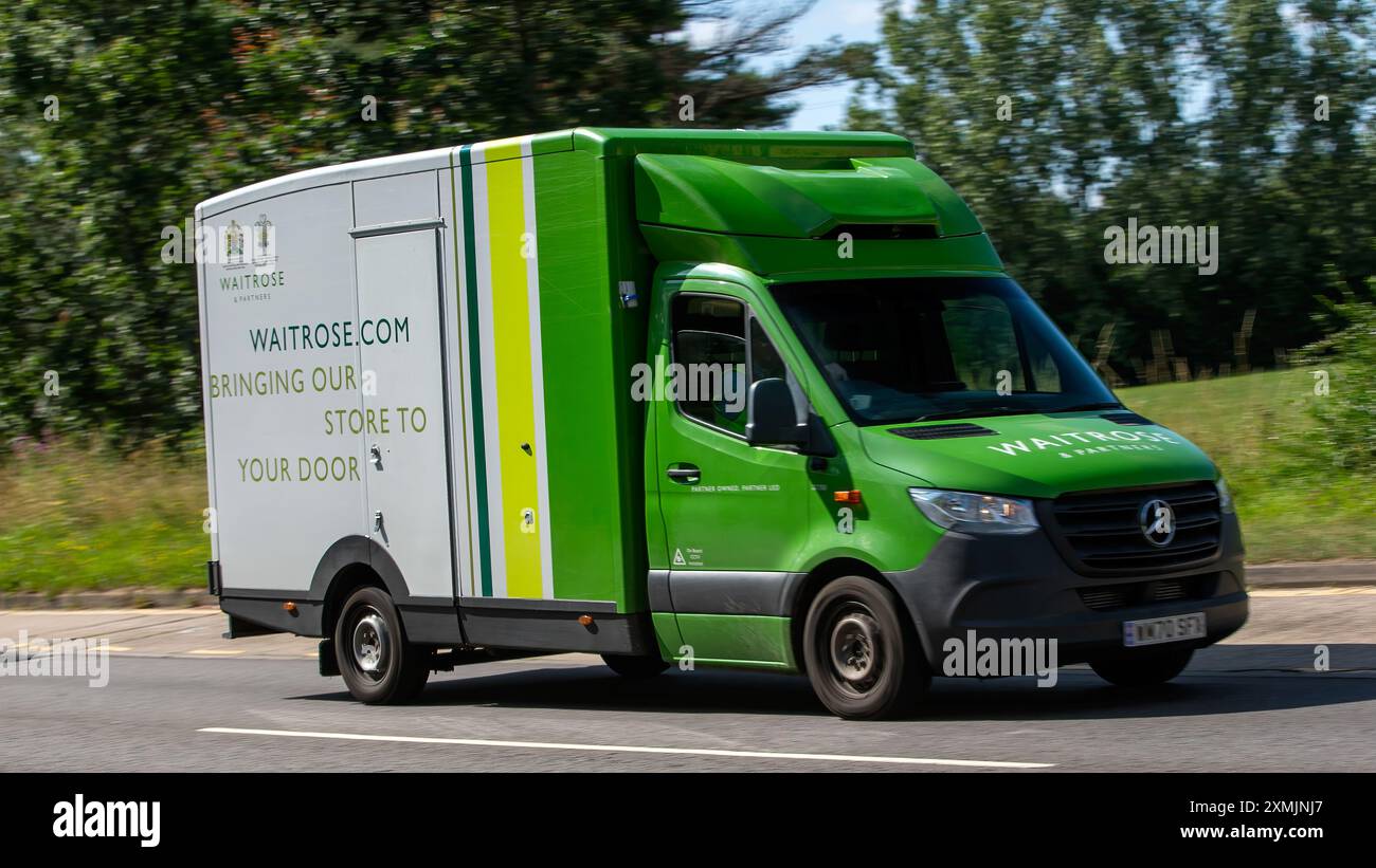 Milton Keynes,UK - July 28th 2024: Waitrose home delivery van driving ...