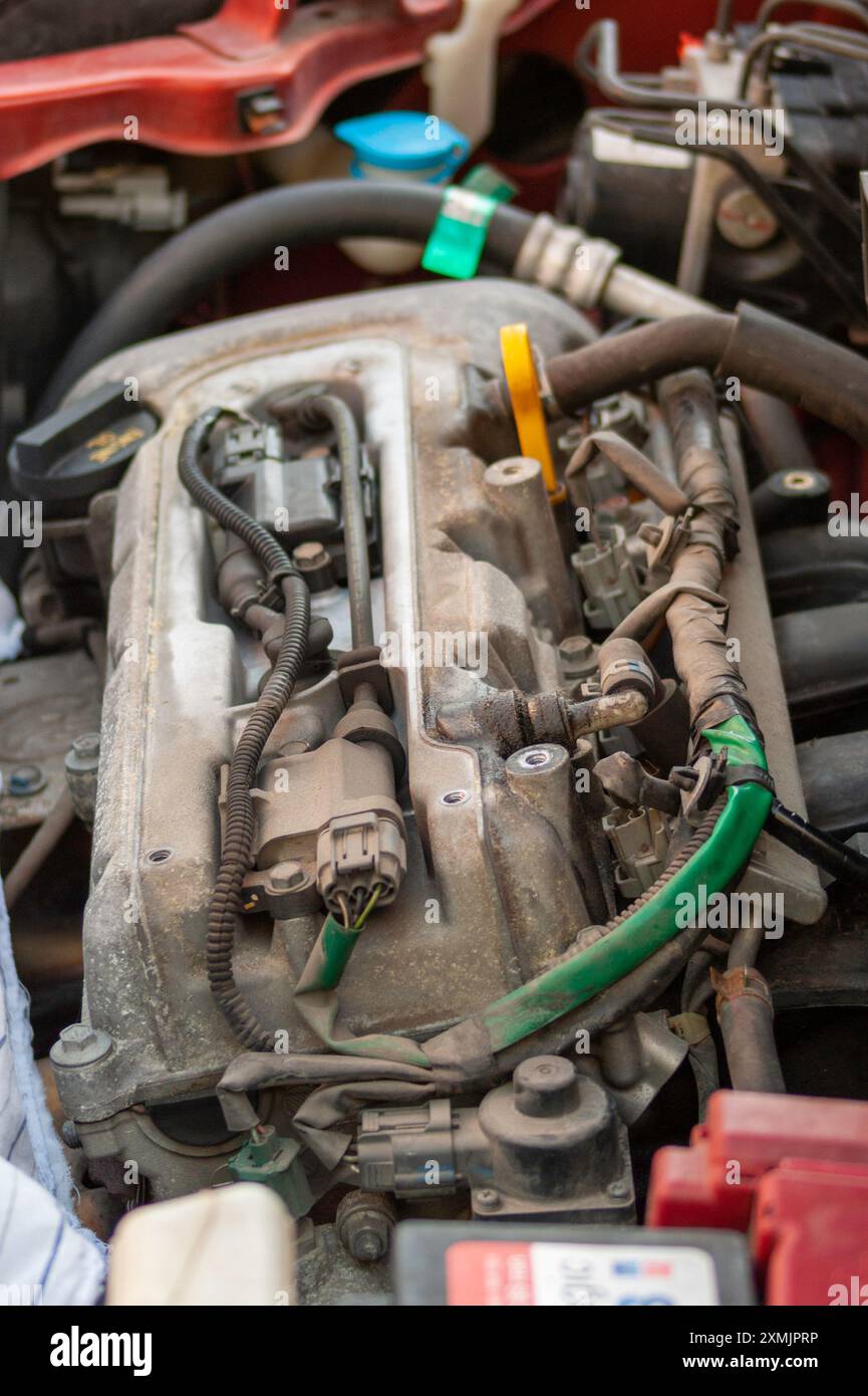 Details of an engine bay with the cables of the ignition system Stock ...