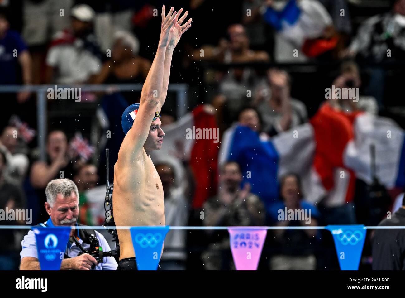 Paris, France. 28th July, 2024. Leon Marchand of France celebrates ...