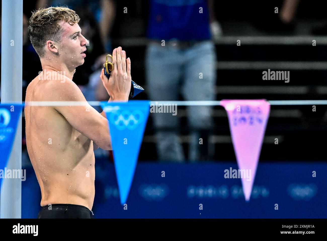 Paris, France. 28th July, 2024. Leon Marchand of France celebrates ...