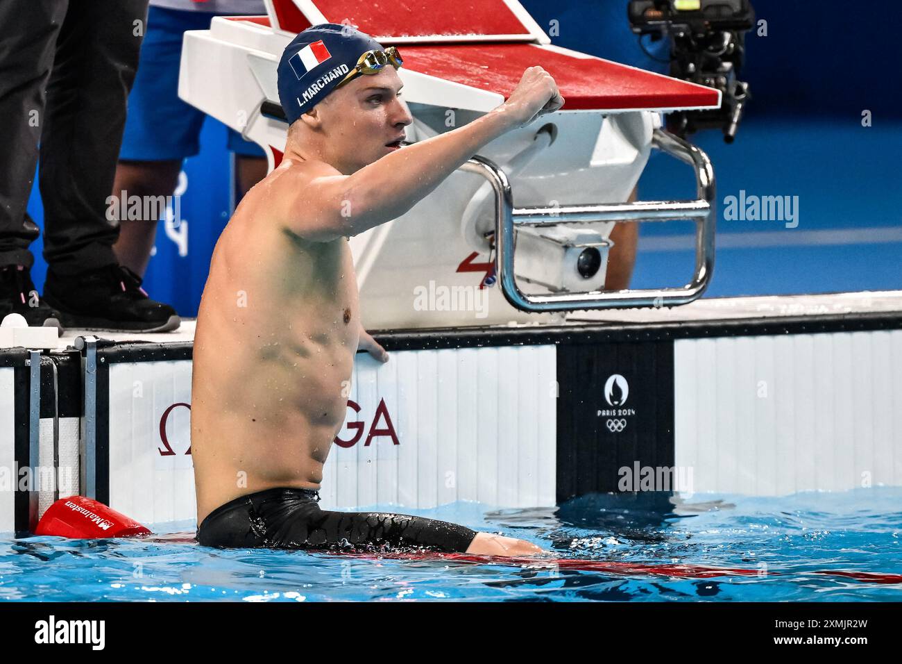 Paris, France. 28th July, 2024. Leon Marchand of France celebrates ...