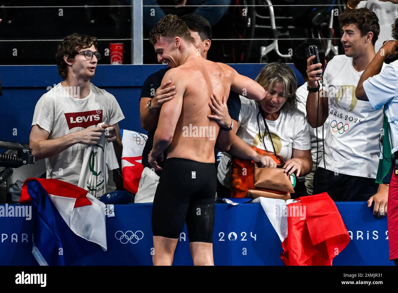 Paris, France. 28th July, 2024. Leon Marchand of France celebrates ...