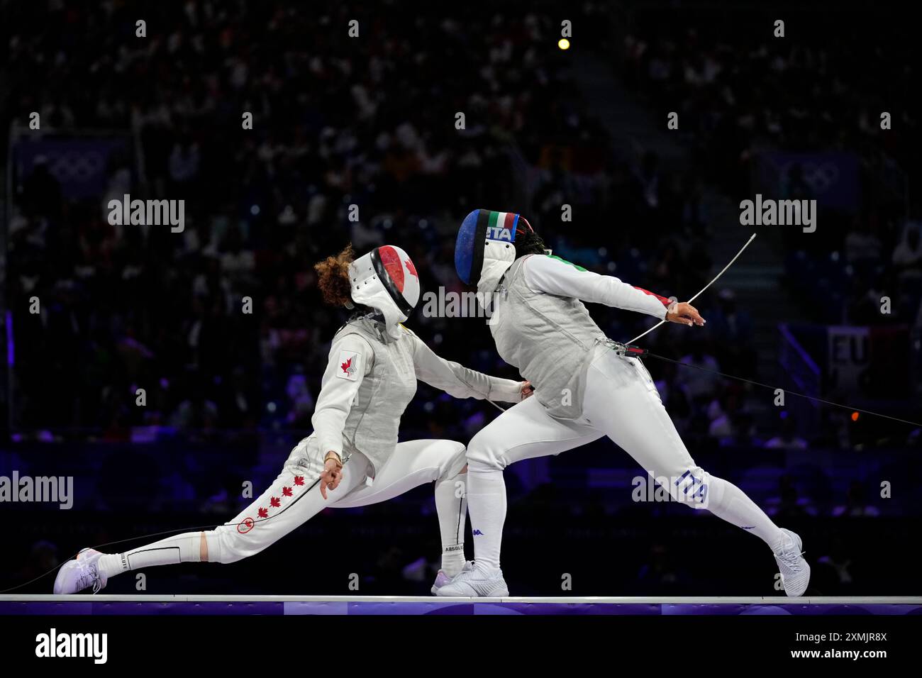 Canada's Eleanor Harvey, left, competes with Italy's Alice Volpi in the ...